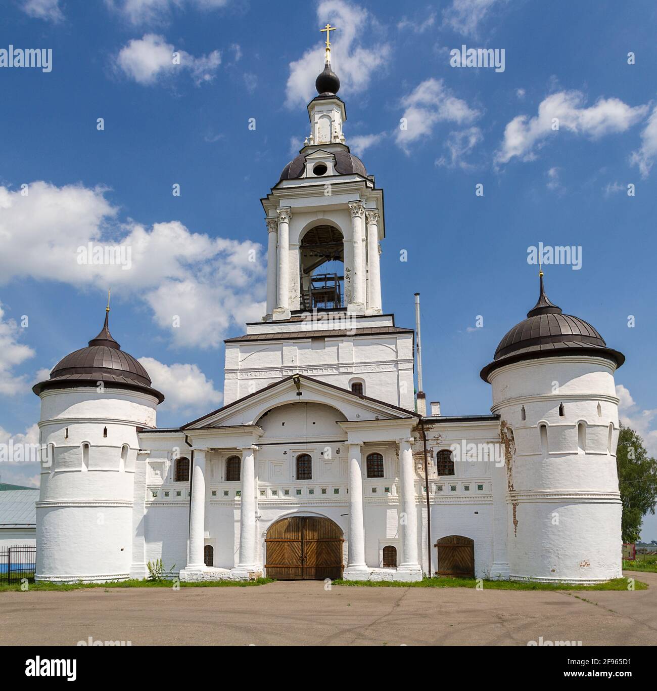 White stone bell tower with two towers of the Avraamiev Epiphany ...