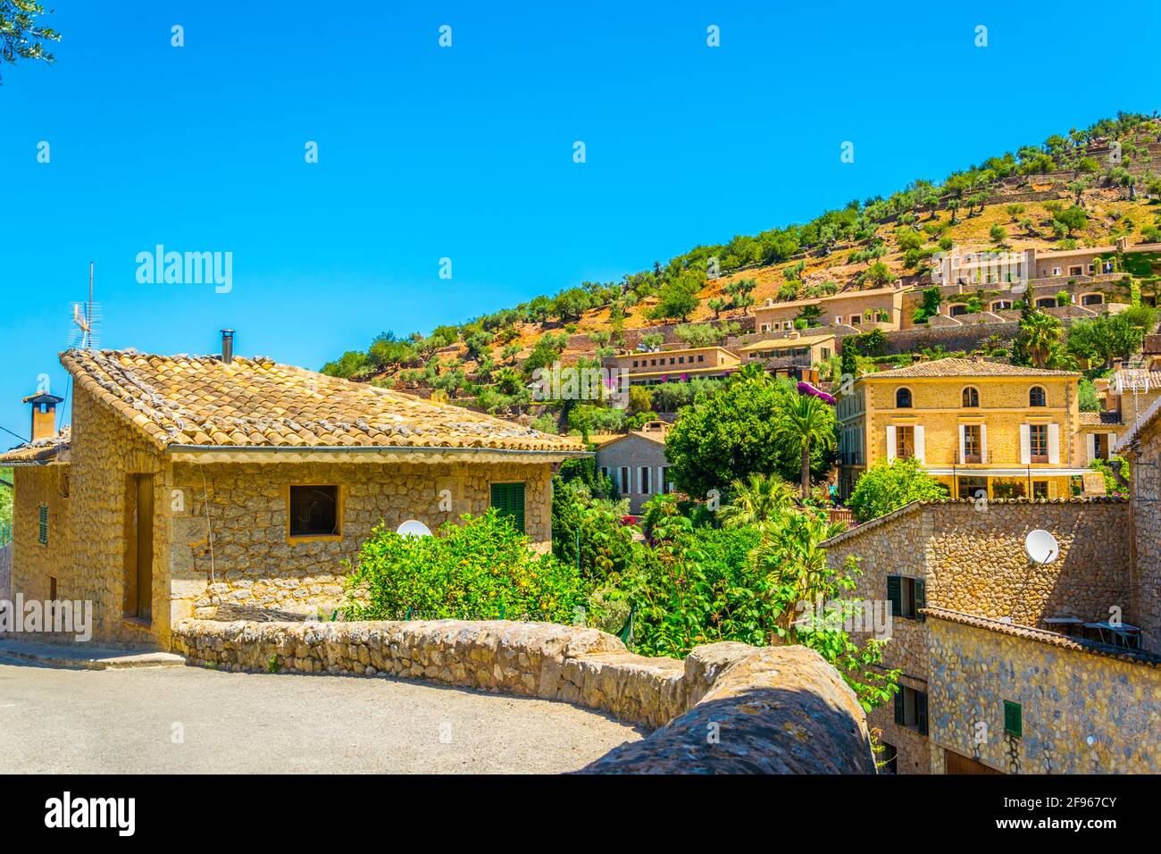 a narrow street in the spanish town Deia at Mallorca Stock Photo - Alamy