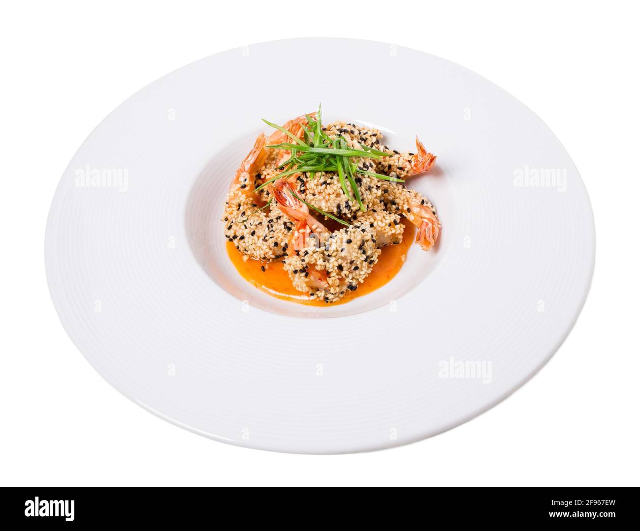 Delicious grilled jumbo shrimps with sesame and sliced scallions on ...