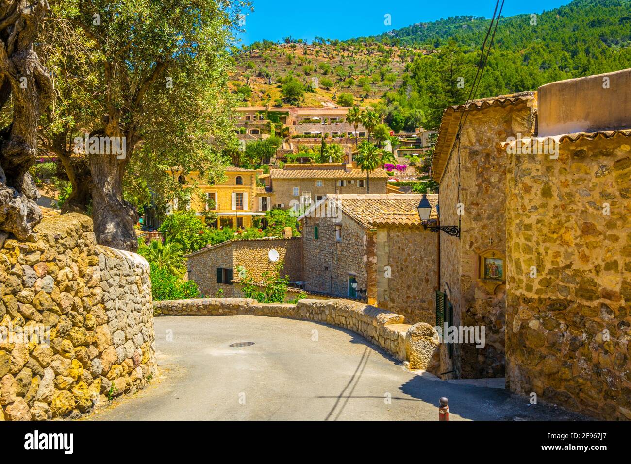 a narrow street in the spanish town Deia at Mallorca Stock Photo - Alamy
