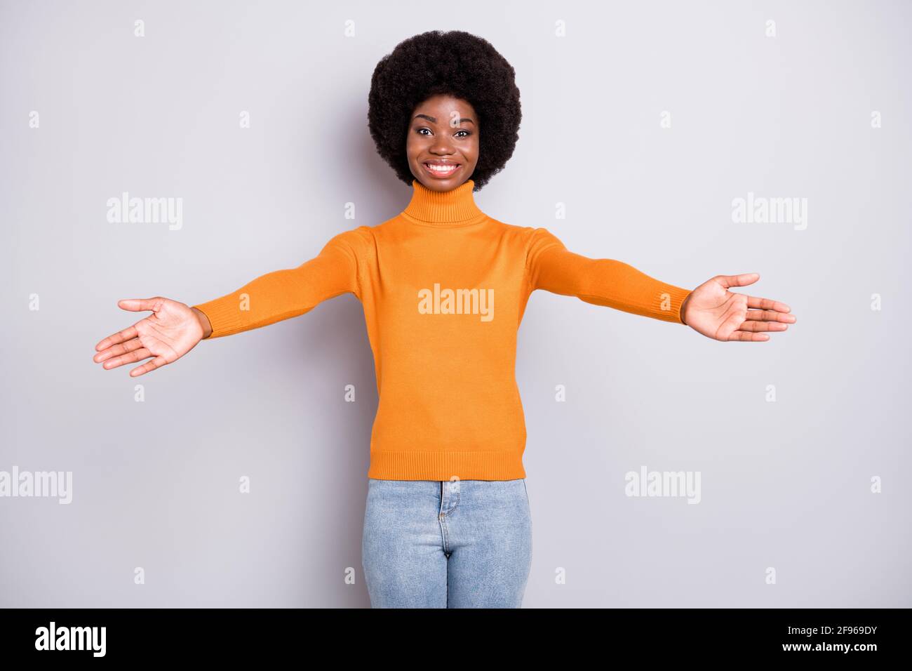 Photo of attractive wavy hairdo dark skin person raise arms to you hug ...