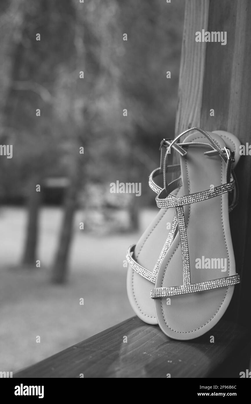 Grayscale shot of the bride's shoes Stock Photo - Alamy