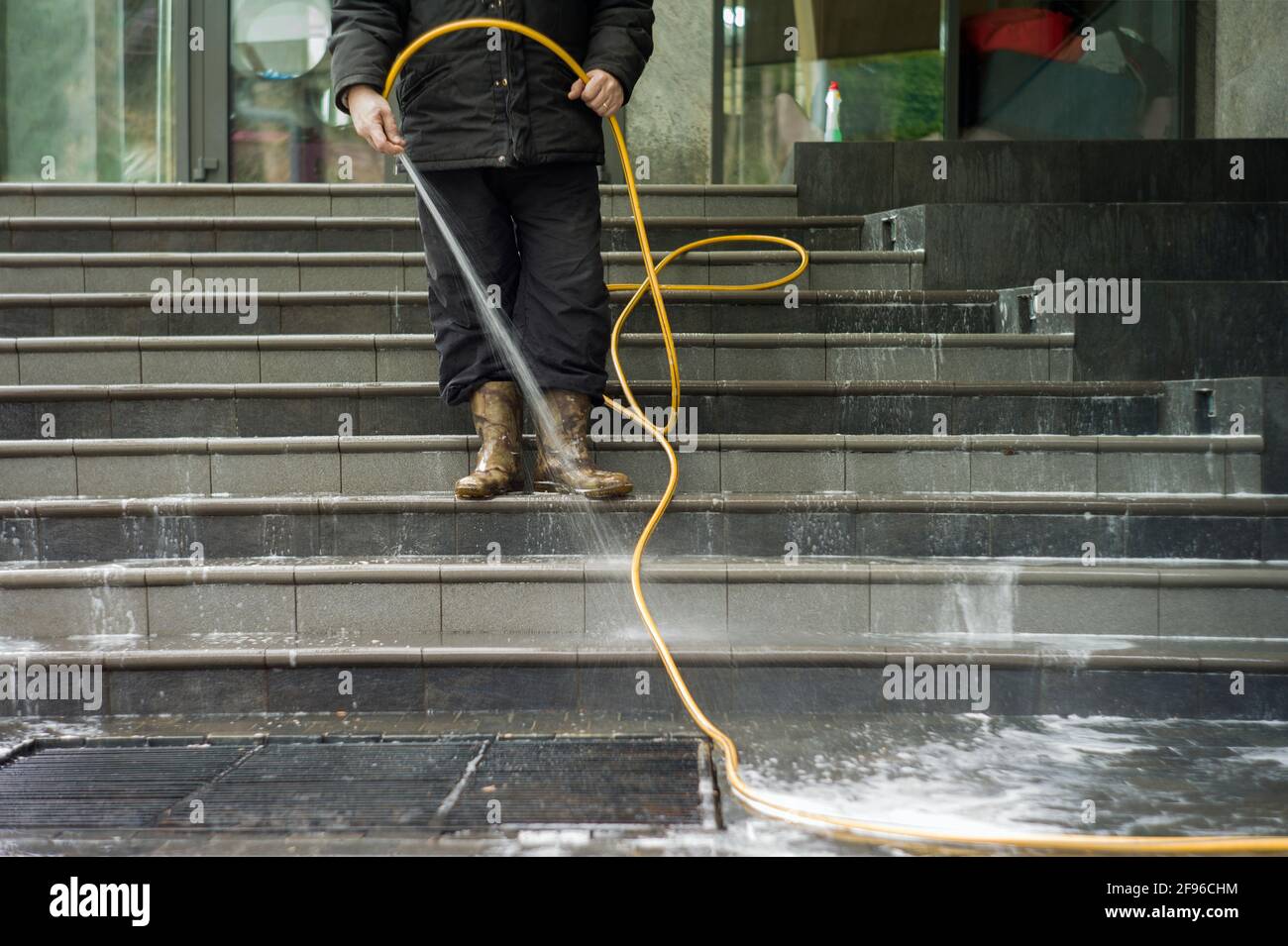Man in rubber boots hi-res stock photography and images - Alamy