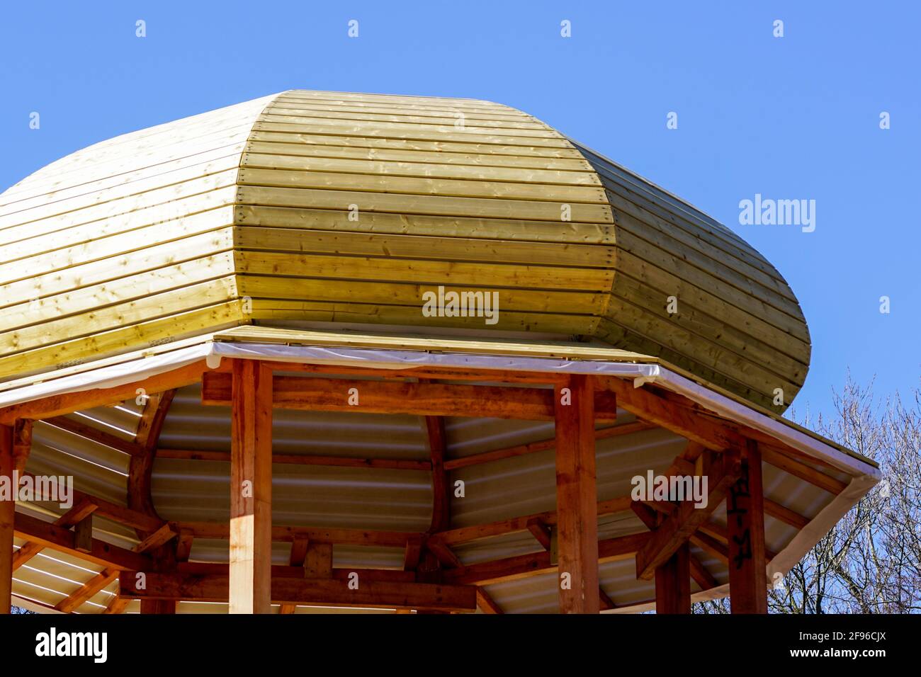 construction of the roof of a new wooden building in the form of a ...