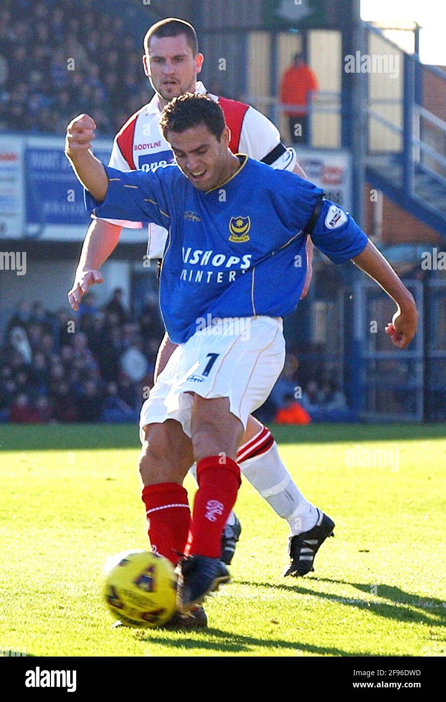 PORTSMOUTH V ROTHERHAM LEO BIAGINI GOES PAST STUART TALBOT PIC MIKE ...