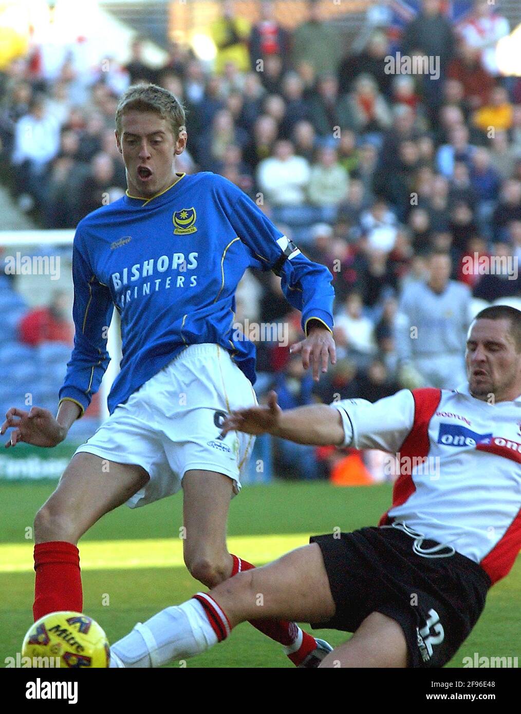 PORTSMOUTH V ROTHERHAM STUART TALBOT SLIDES IN ON PETER CROUCH. PIC ...