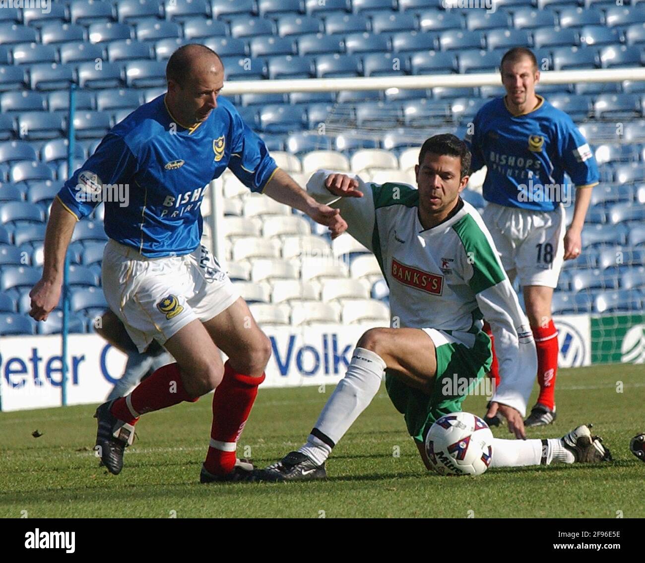 PORTSMOUTH V WALSALL. MLADEN RUDONJA IS TACKLED BY IAN ROPER. PIC MIKE ...