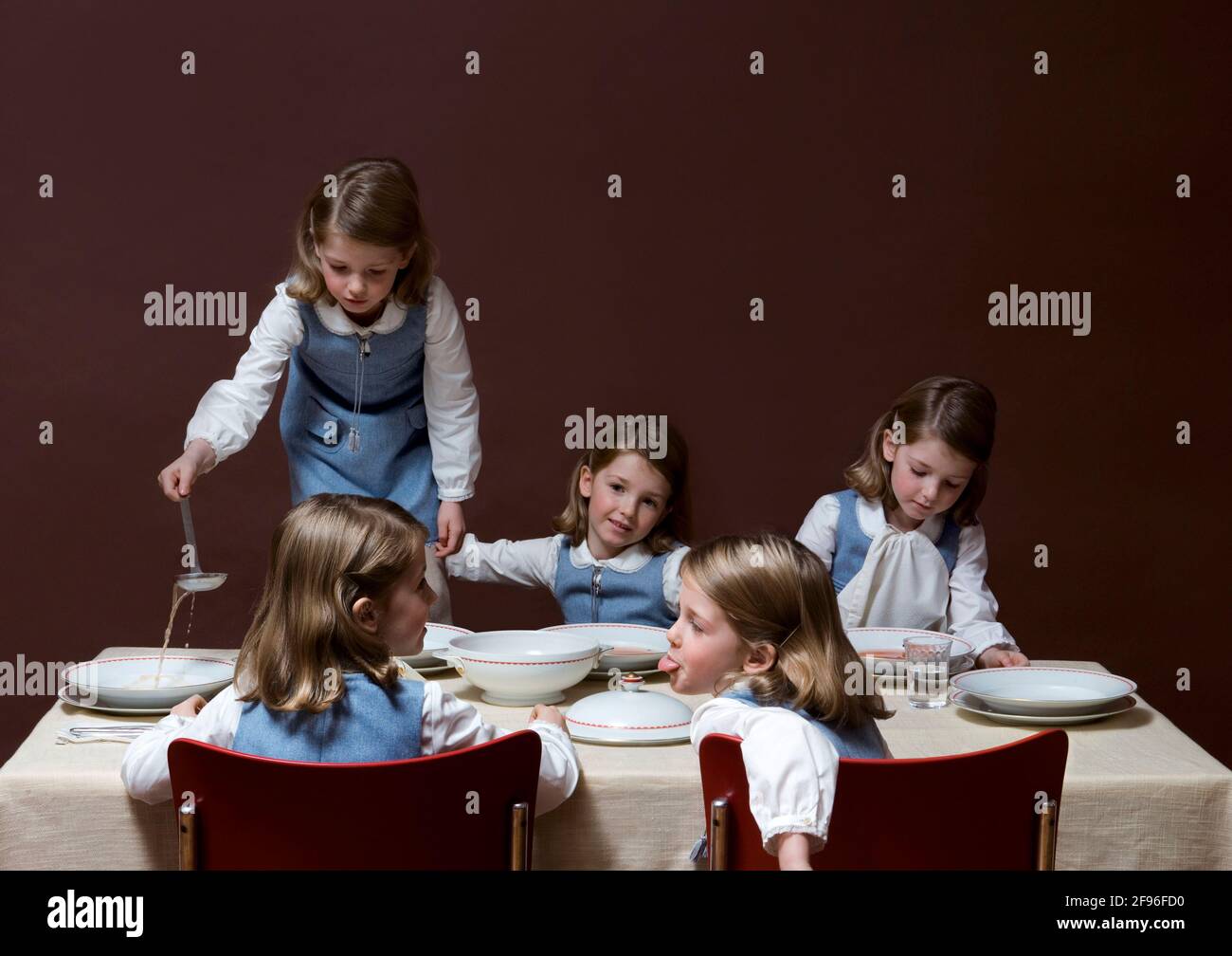 Child at the set dining table Stock Photo - Alamy