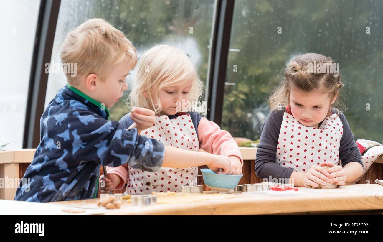 Boy girl baking concentrating hi-res stock photography and images - Alamy