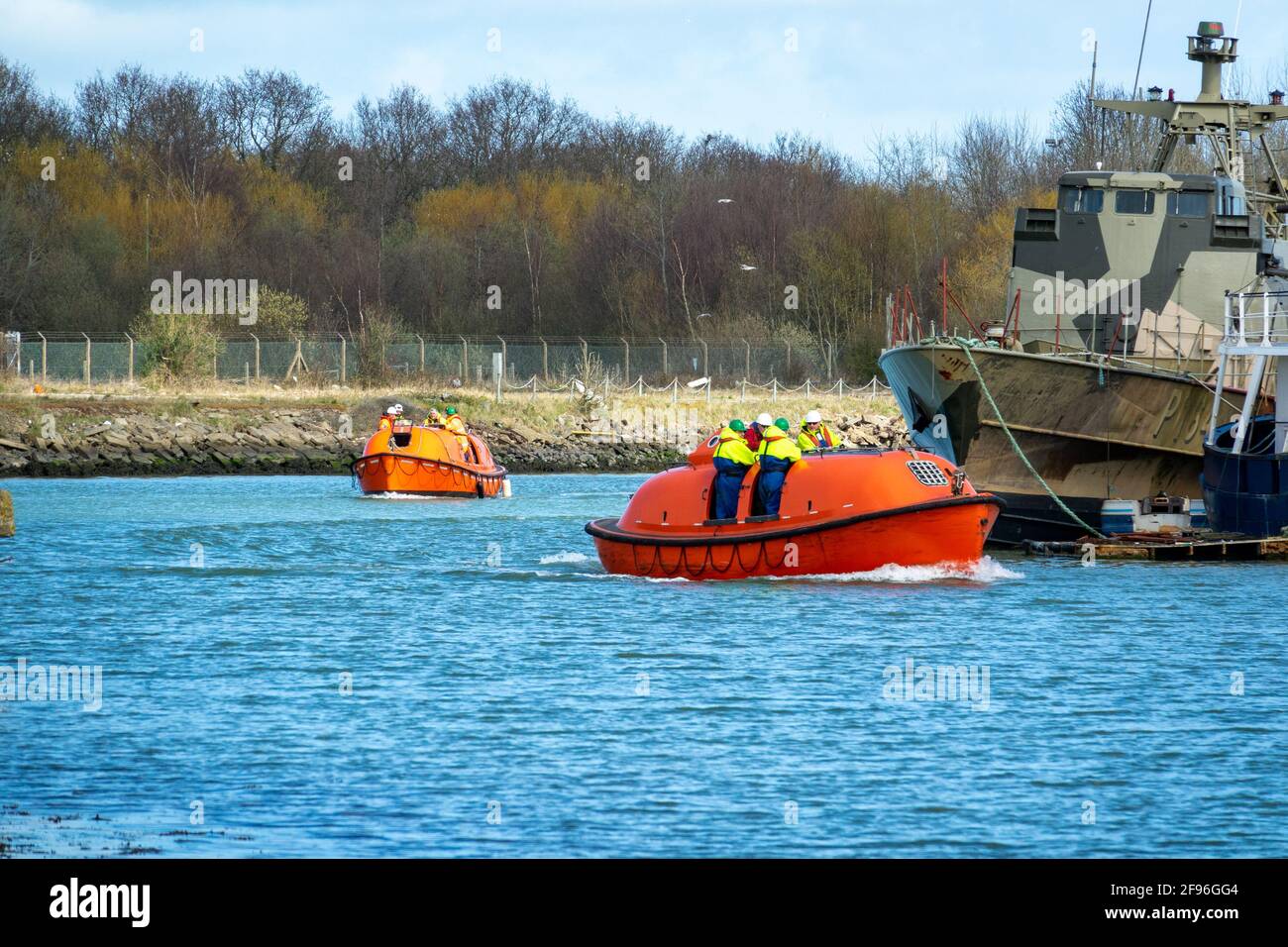 Oil ring offshore Lifeboats training Stock Photo - Alamy