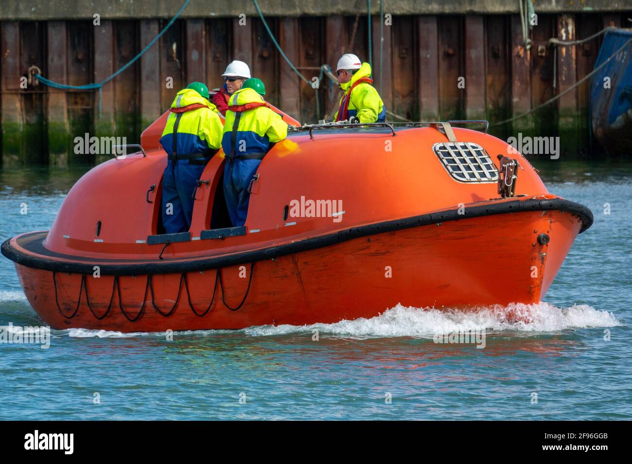Oil ring offshore Lifeboats training Stock Photo - Alamy