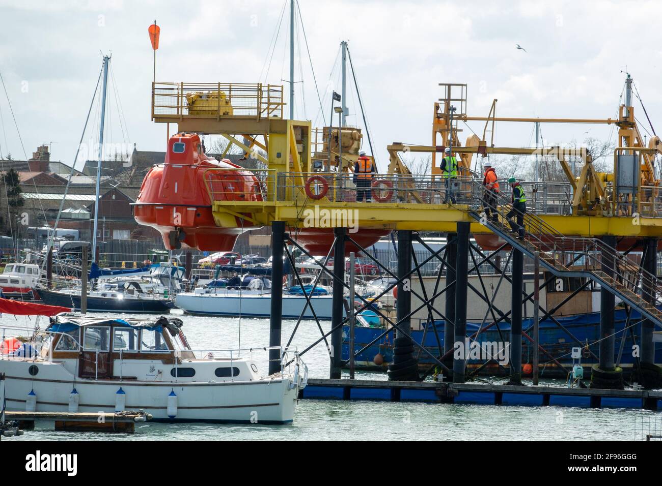 Oil ring offshore Lifeboats training Stock Photo - Alamy