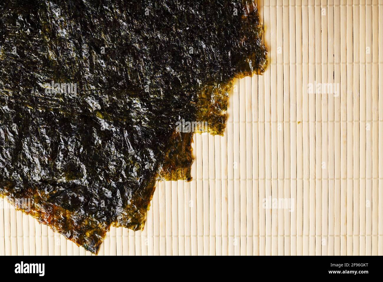 Sushi nori leaves on bamboo background with free space. View from above ...