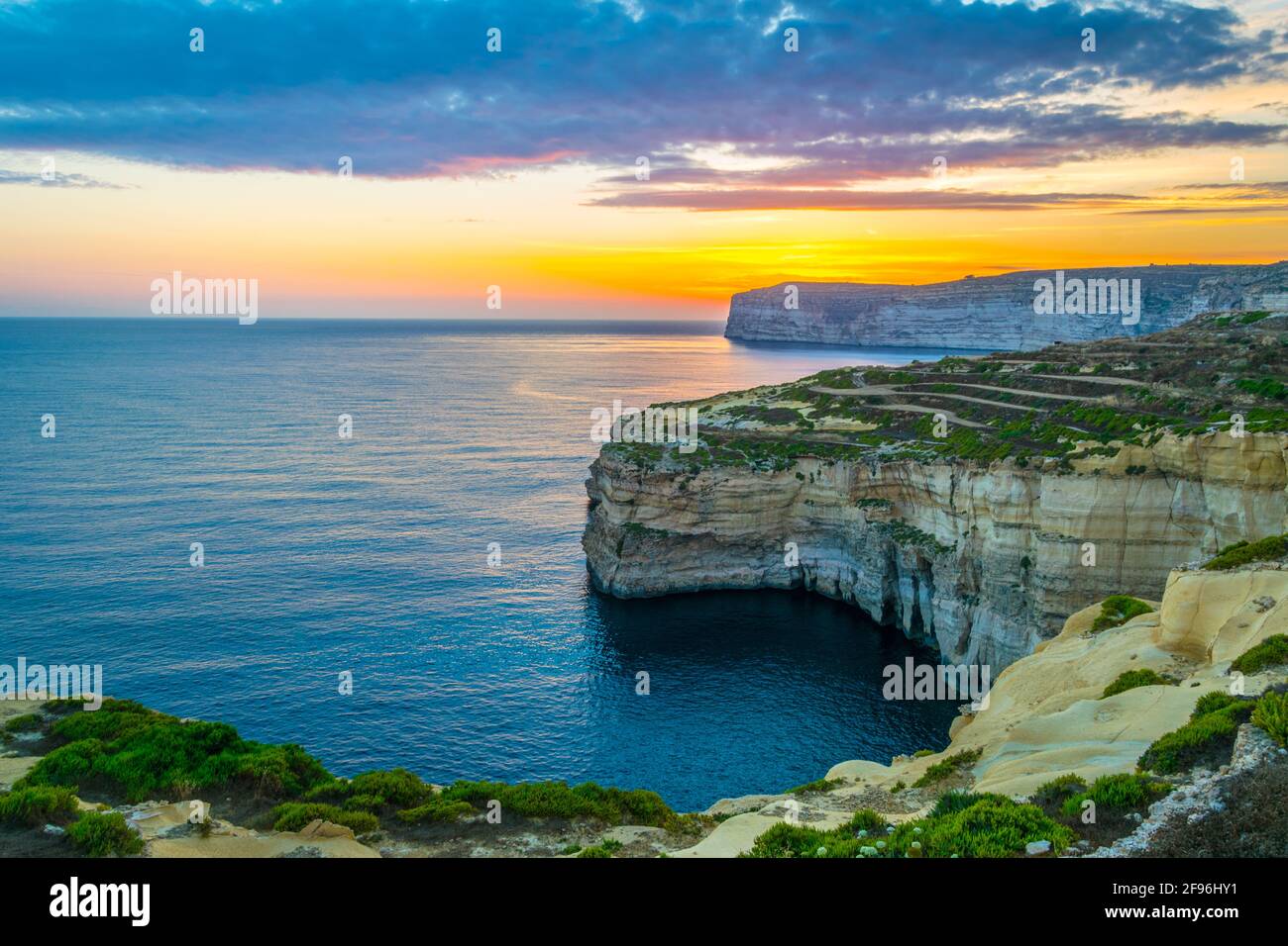 Sunset view over Sanap cliffs on Gozo, Malta Stock Photo - Alamy