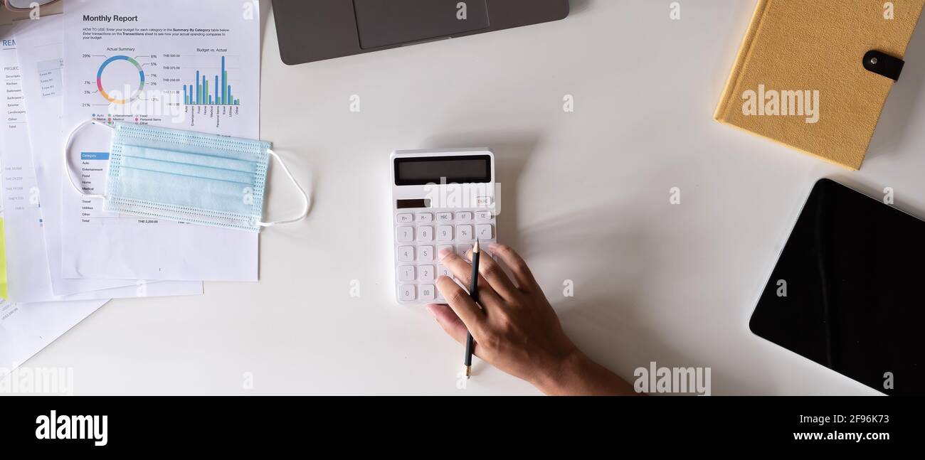 Top view hand of accountant using calculator on workplace, calculator ...