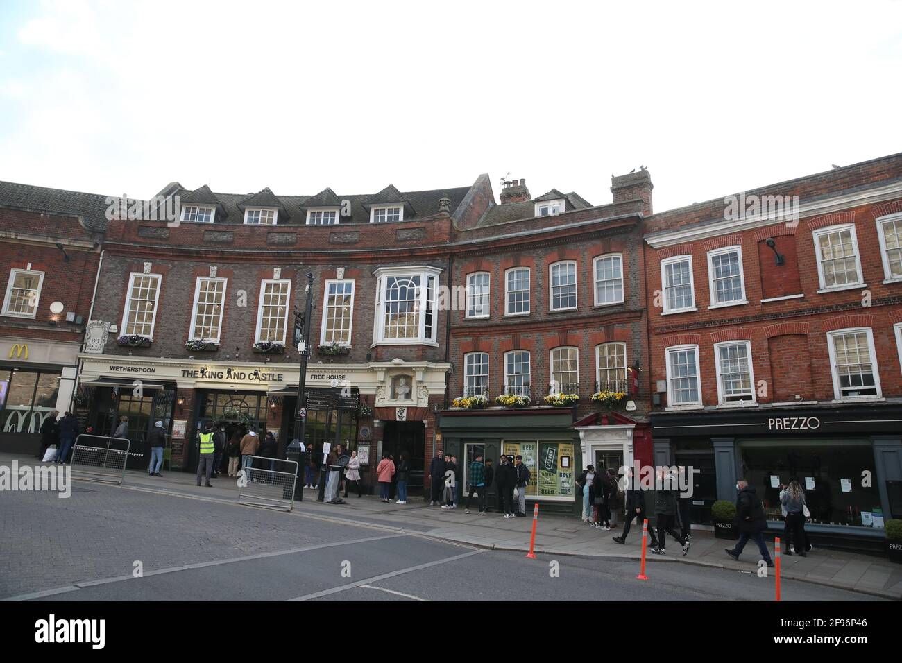People queue outside Wetherspoon's, King and Castle pub in Windsor ...