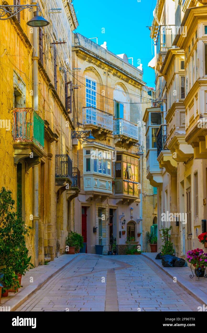 View of a narrow street in the historical center of Birgu, Malta Stock ...