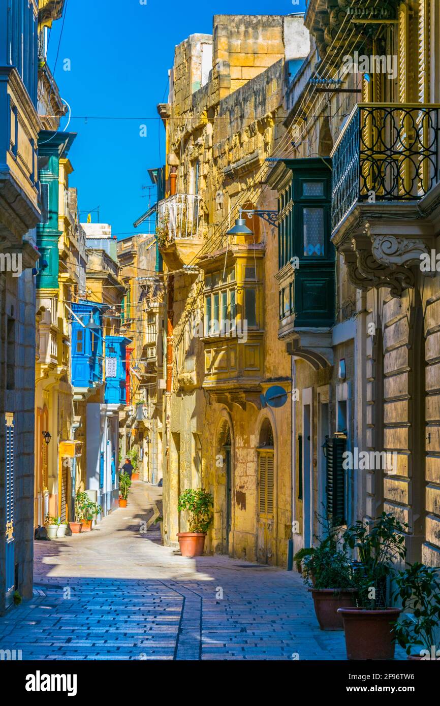 View of a narrow street in the historical center of Birgu, Malta Stock ...