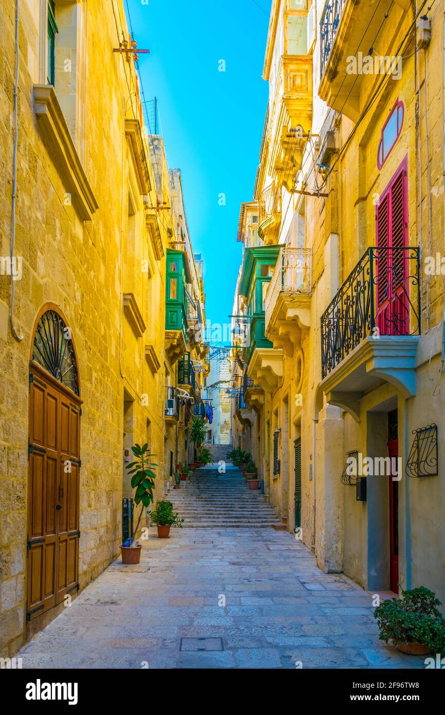 View of a narrow street in the historical center of Birgu, Malta Stock ...