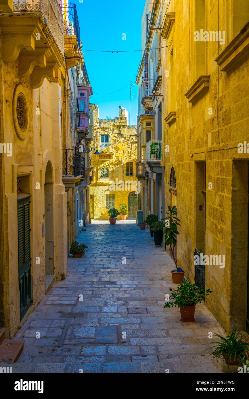 View of a narrow street in the historical center of Birgu, Malta Stock ...