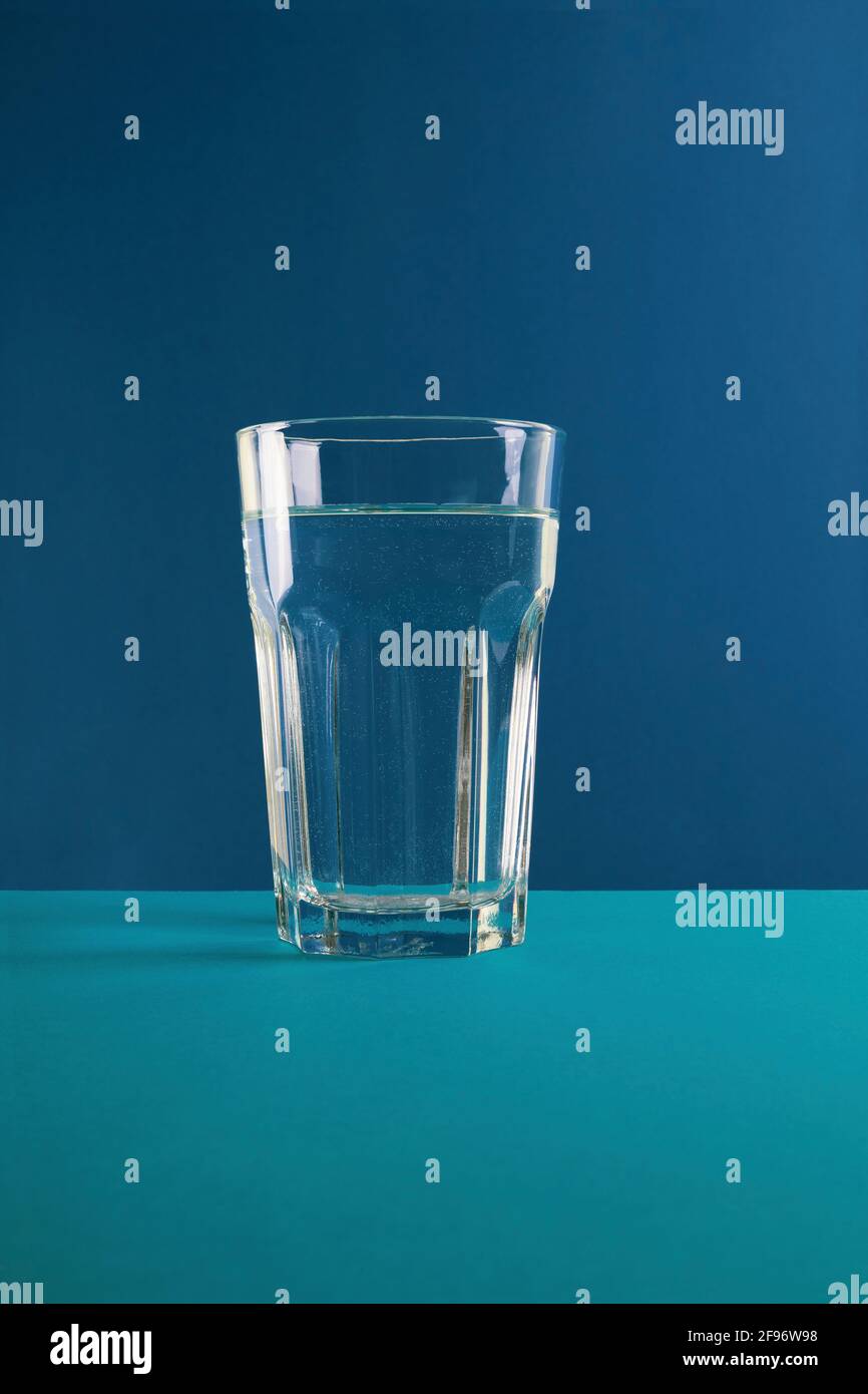 World Water Day. Glass of water fresh and pure water on blue background ...