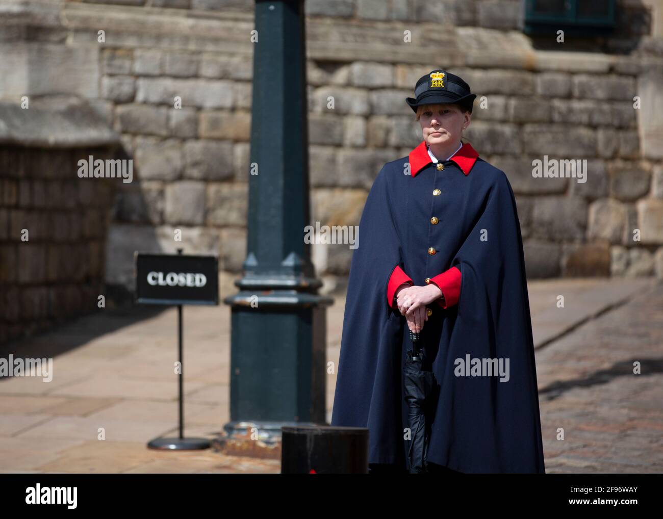 A warden guard waits in front of Windsor Castle, following the April ...
