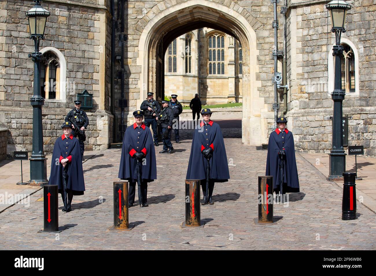 Armed police officers and women warden guards stand in front of Windsor ...