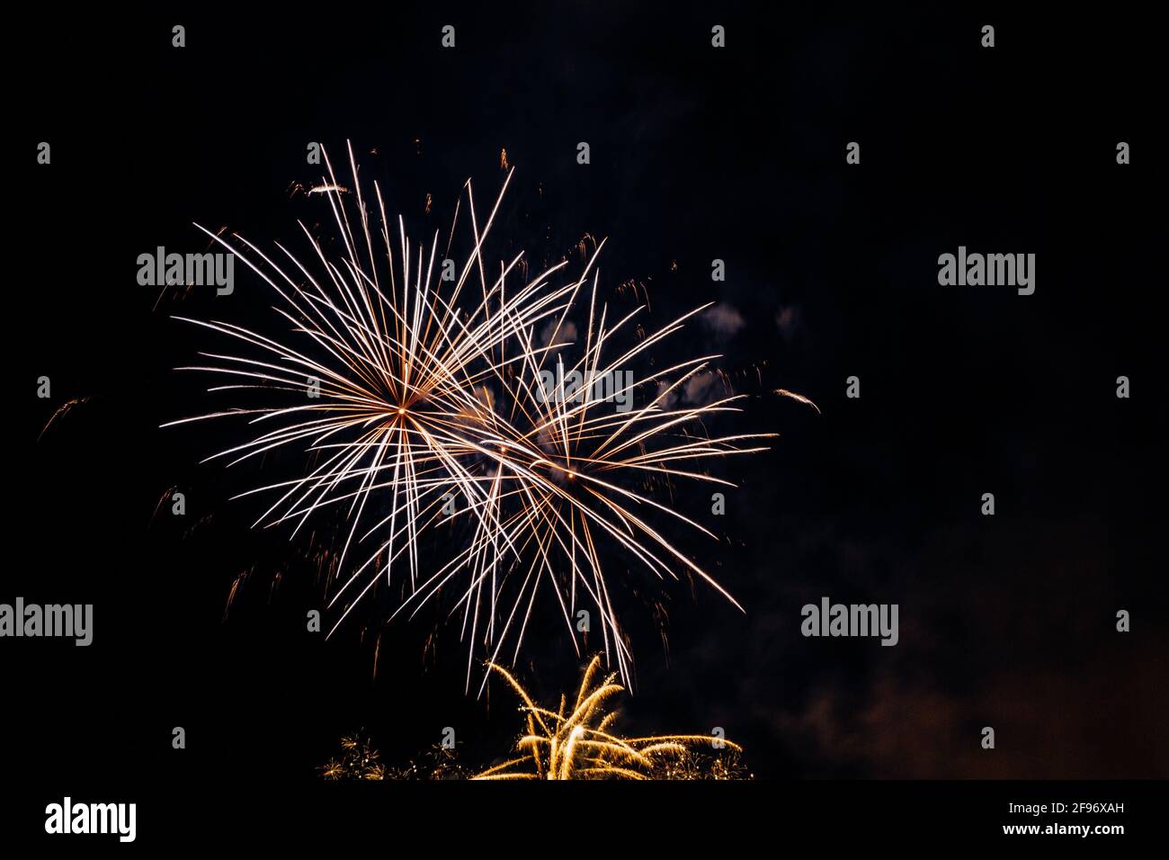 Low angle shot of bright fireworks at night - great for wallpapers and ...