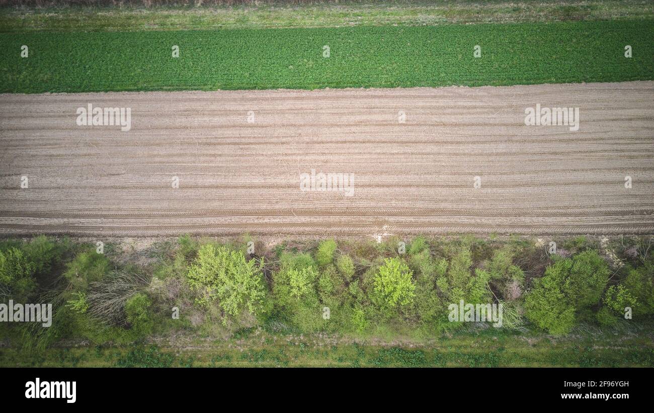 Top down view of ploughed agricultural fields photographed with drone ...