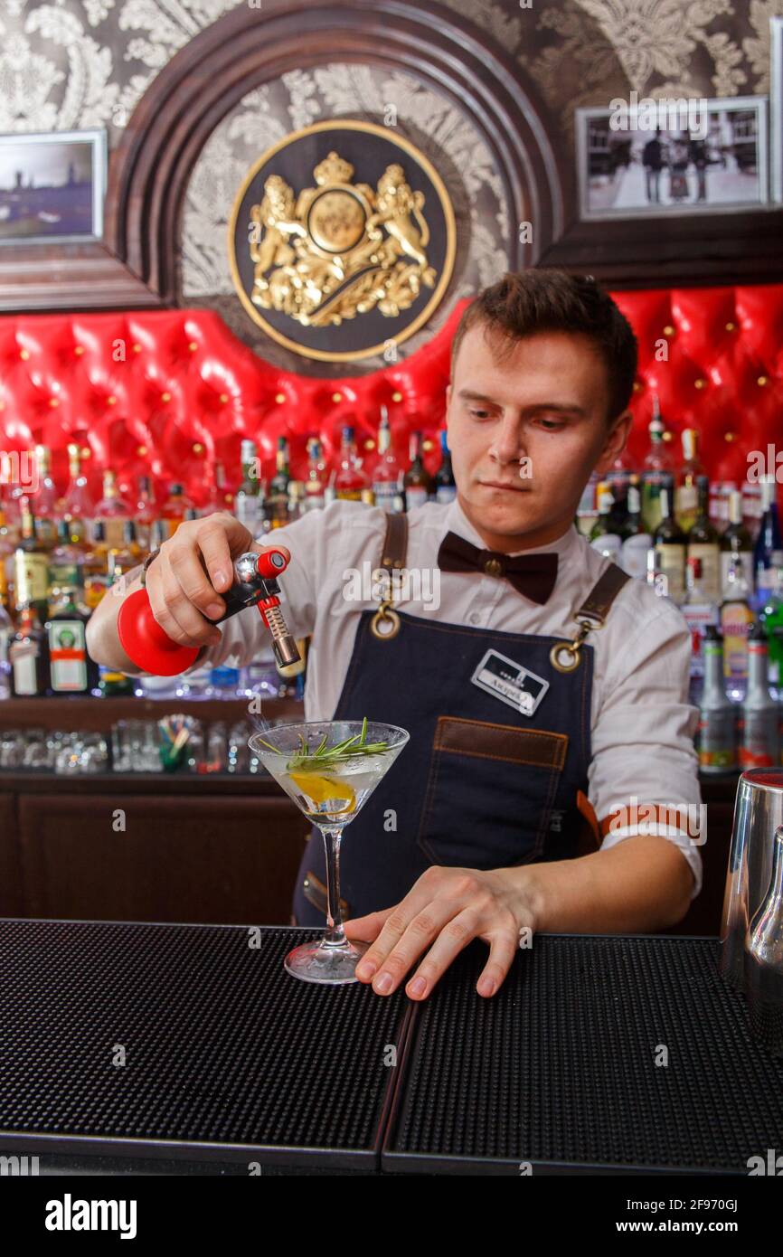 Young working class man in bar hi-res stock photography and images - Alamy