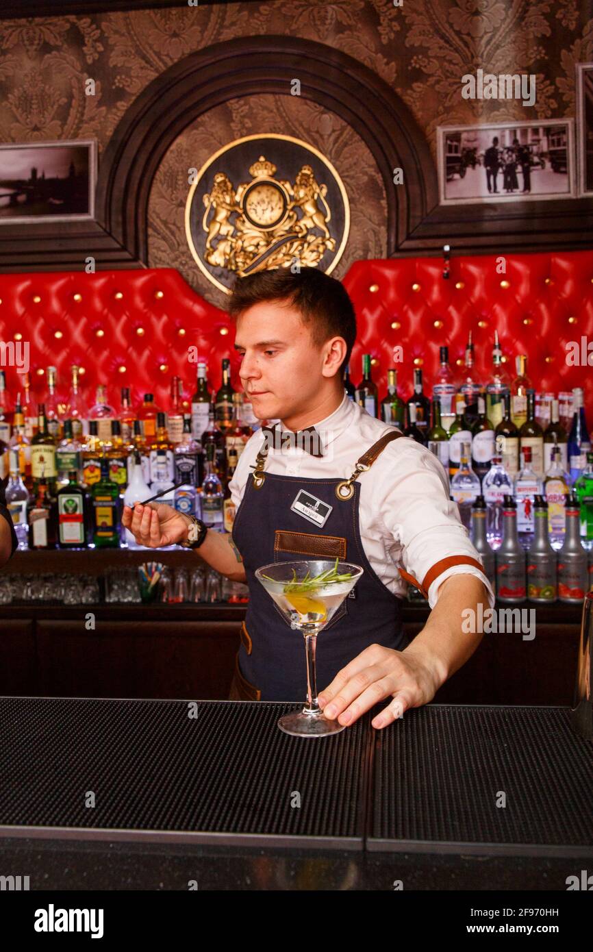 Young working class man in bar hi-res stock photography and images - Alamy