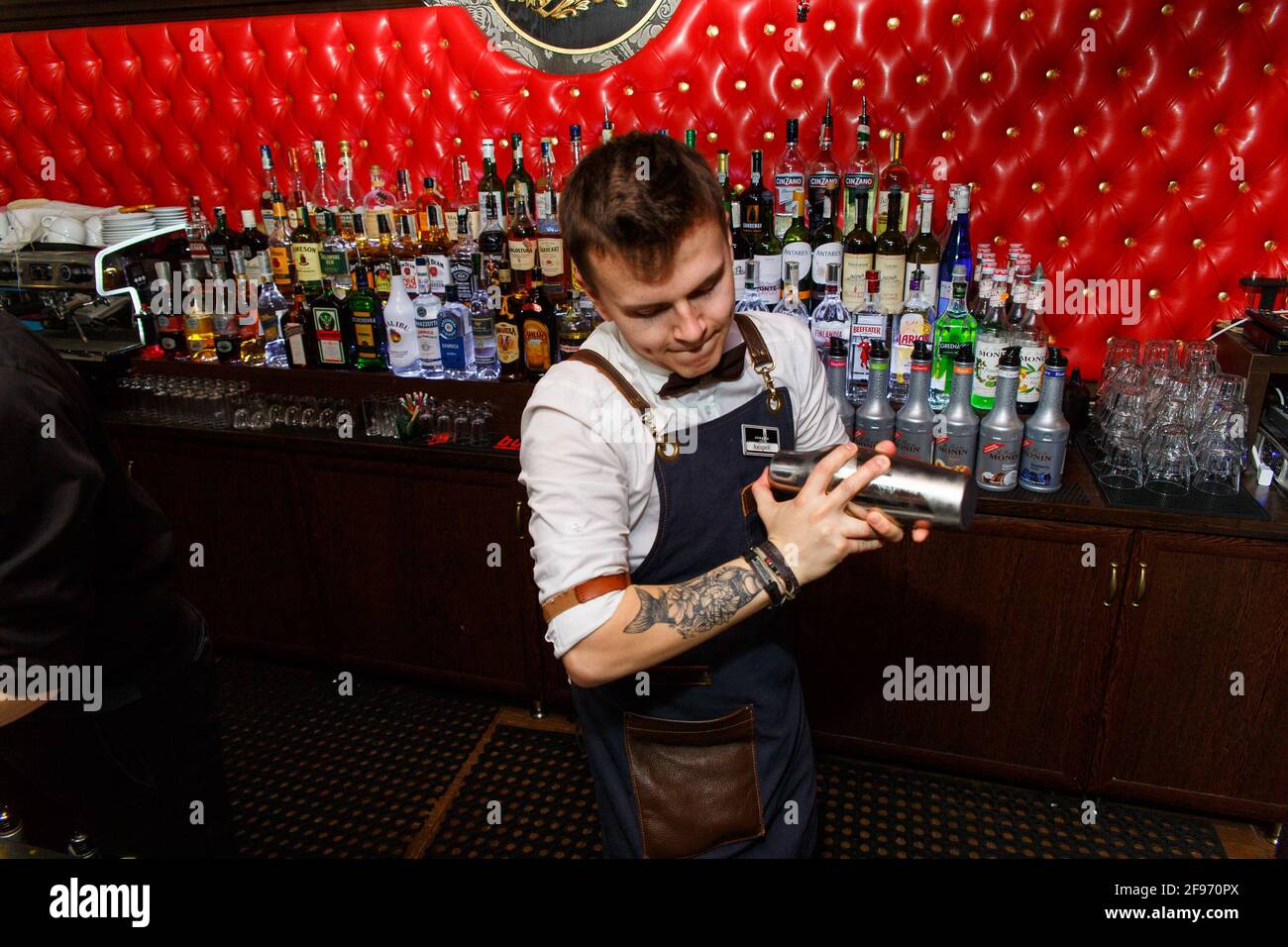 Young working class man in bar hi-res stock photography and images - Alamy