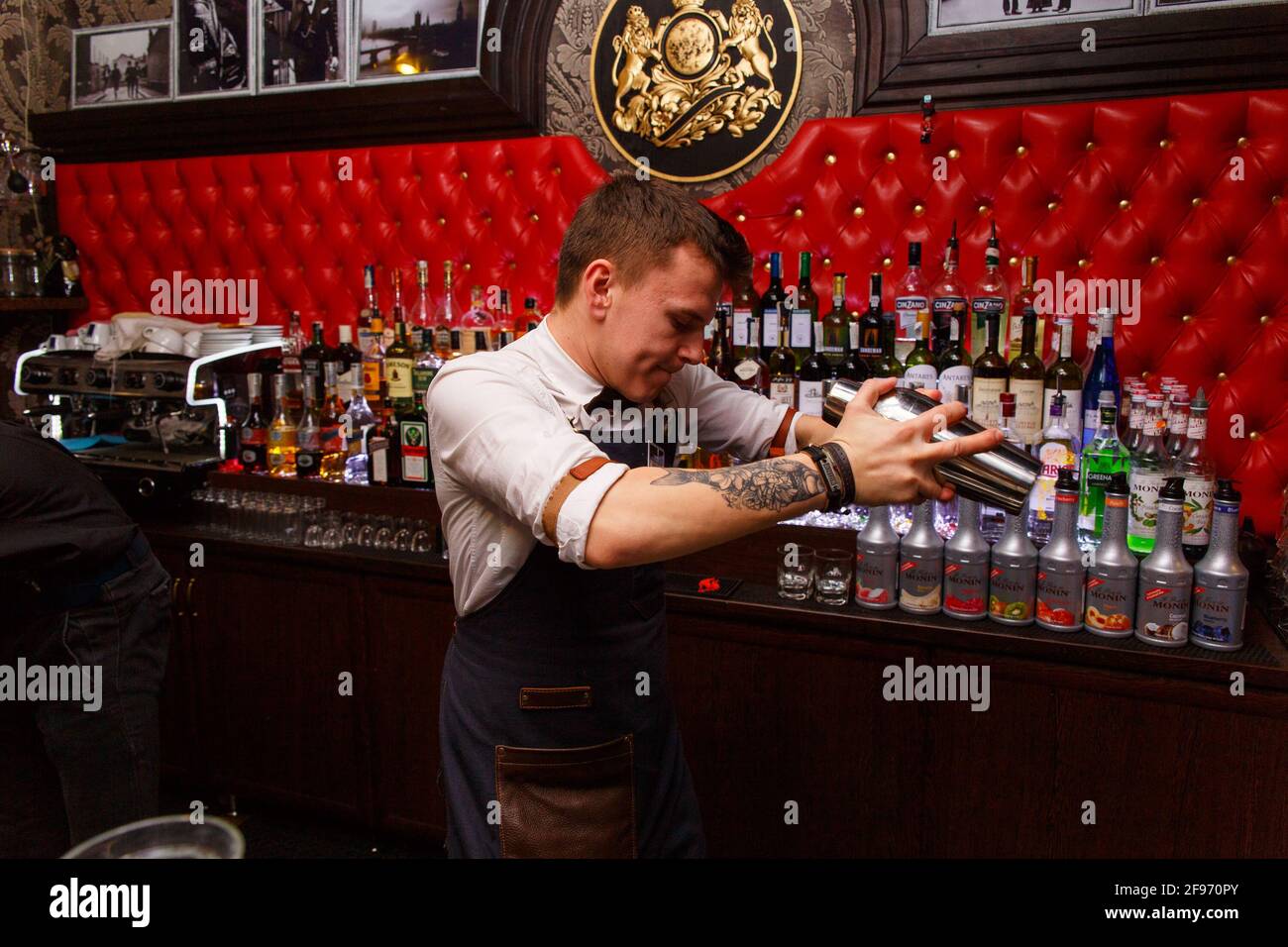 Young working class man in bar hi-res stock photography and images - Alamy