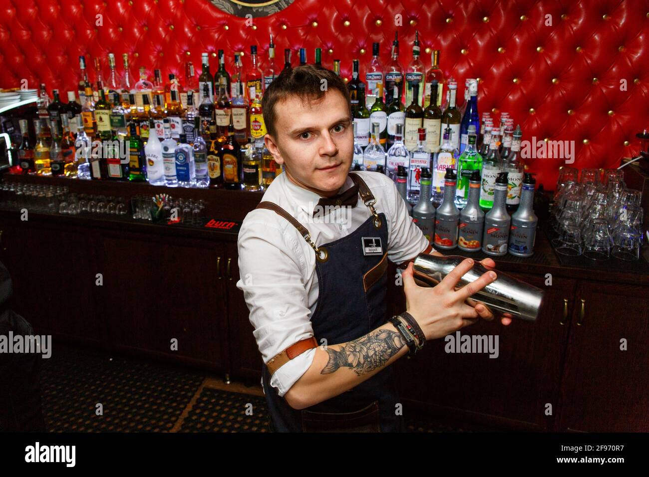 Young working class man in bar hi-res stock photography and images - Alamy