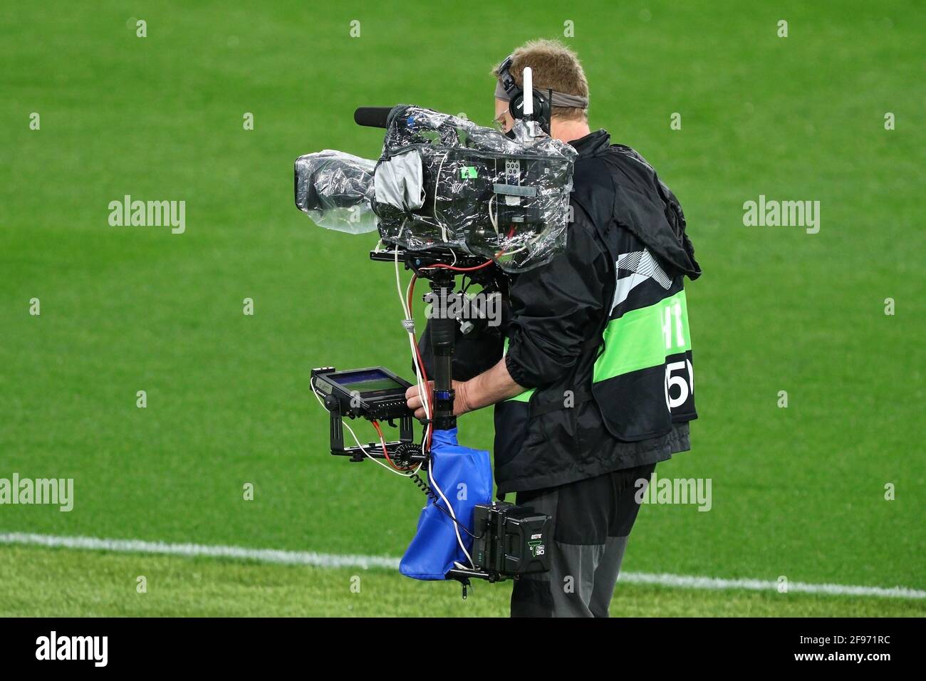 A TV cameraman is at work during the UEFA Europa League, quarter-finals ...