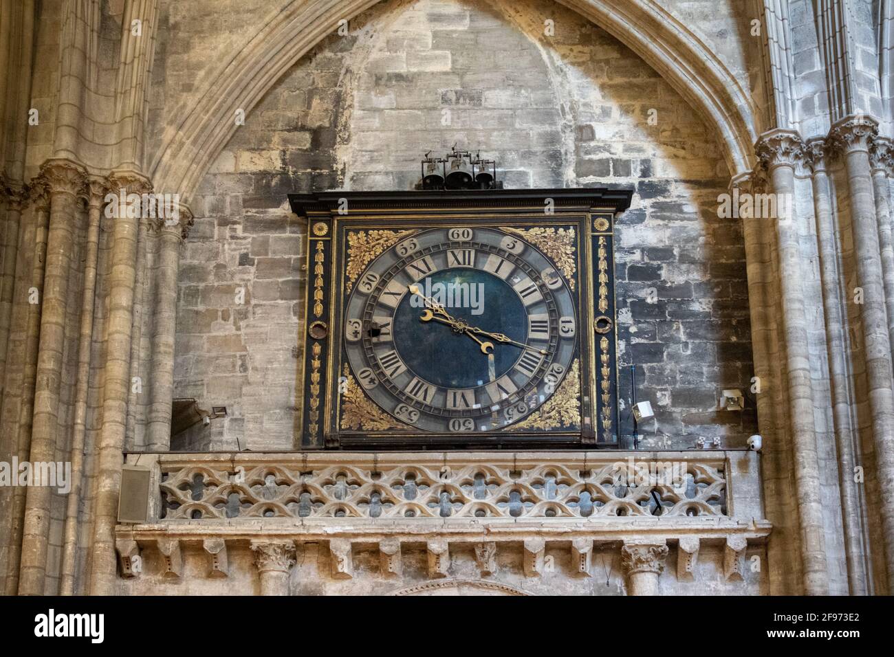 Ancient clock on the wall of the Gothic cathedral of Saint Andre in ...