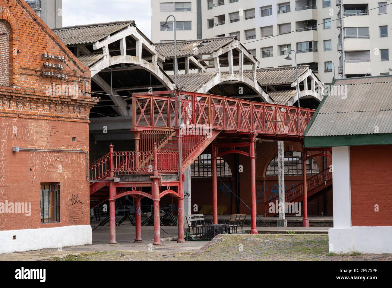 Beautiful red building with stairs going up the side of the building ...