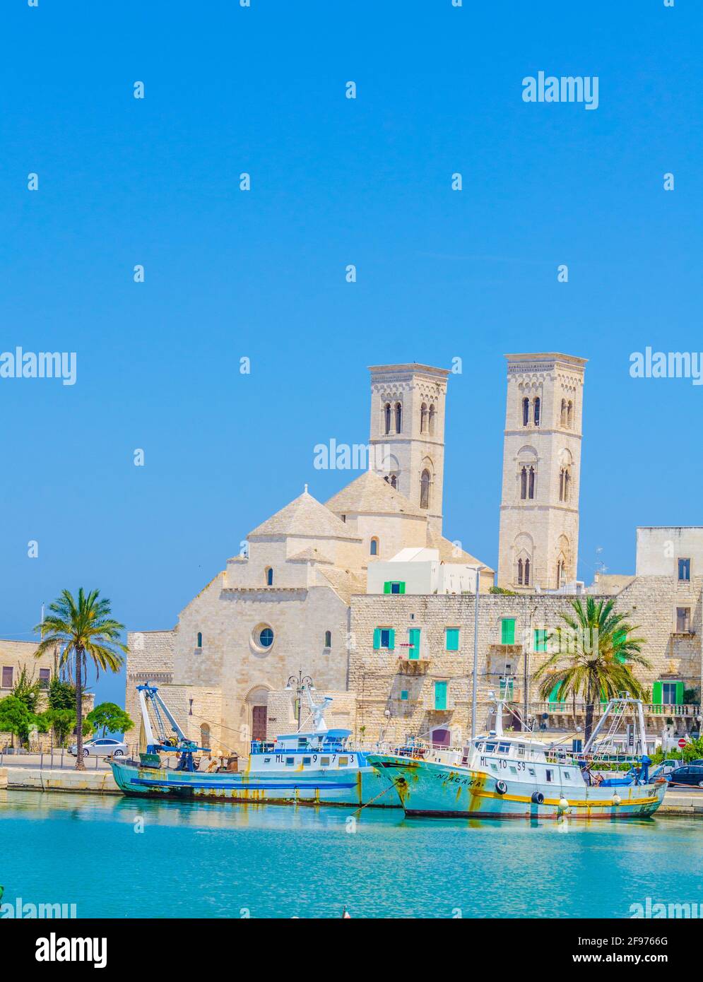 View of the port of Molfetta dominated by a majestic building of the ...