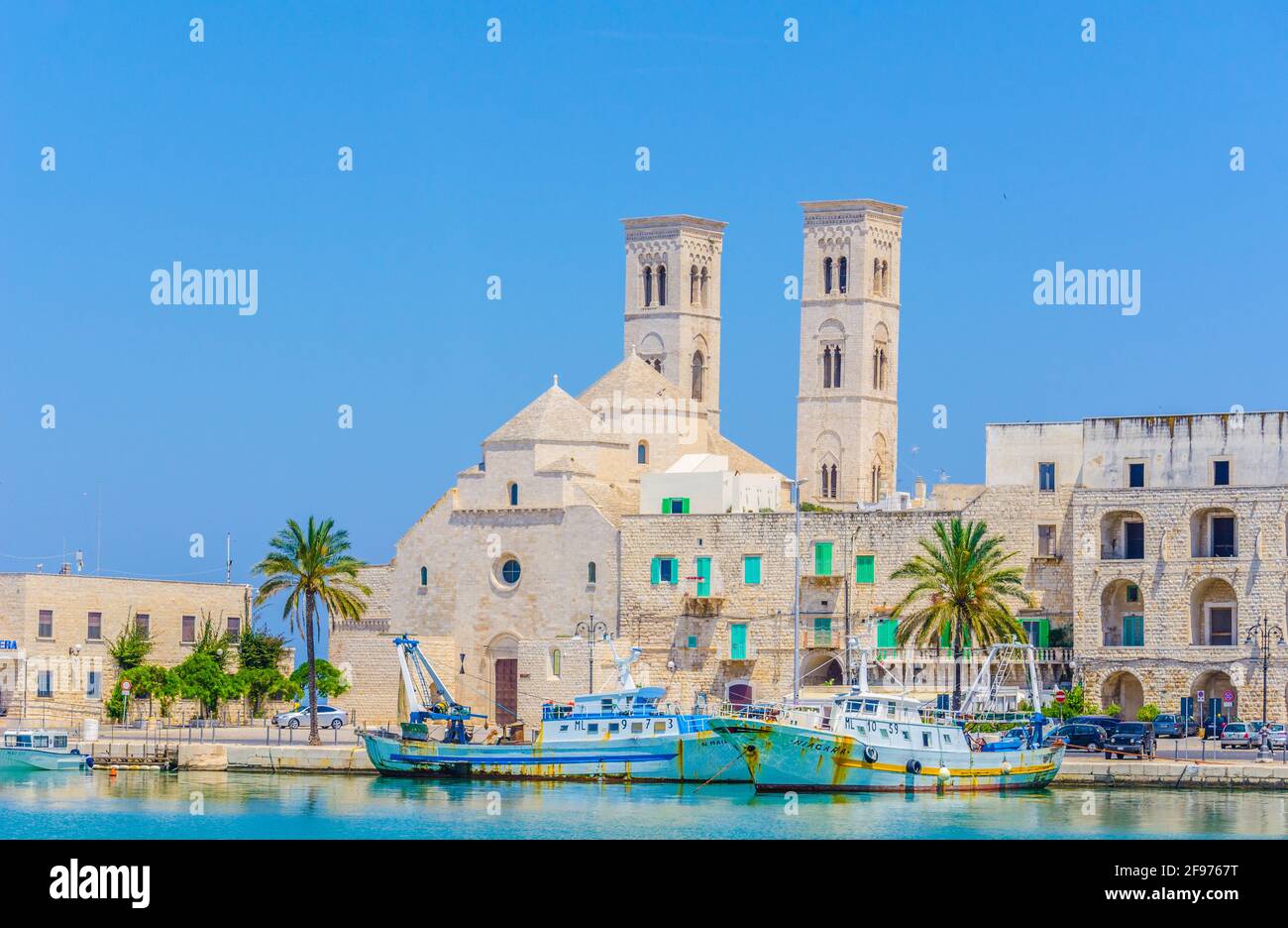 View of the port of Molfetta dominated by a majestic building of the ...