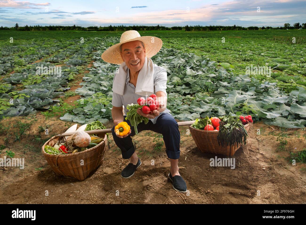 Sitting on a farm farmers Stock Photo - Alamy