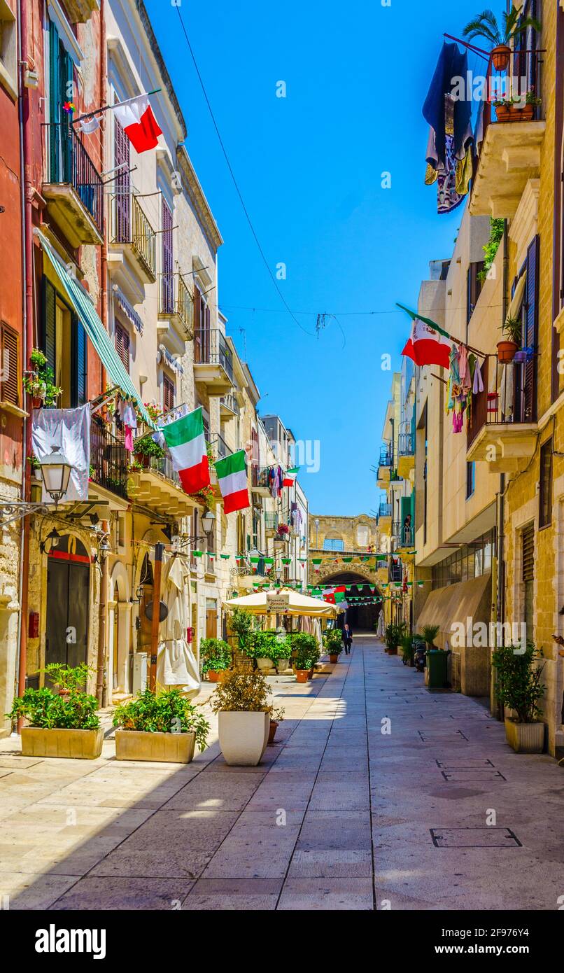 View of a narrow street in the Italian city Bari Stock Photo - Alamy