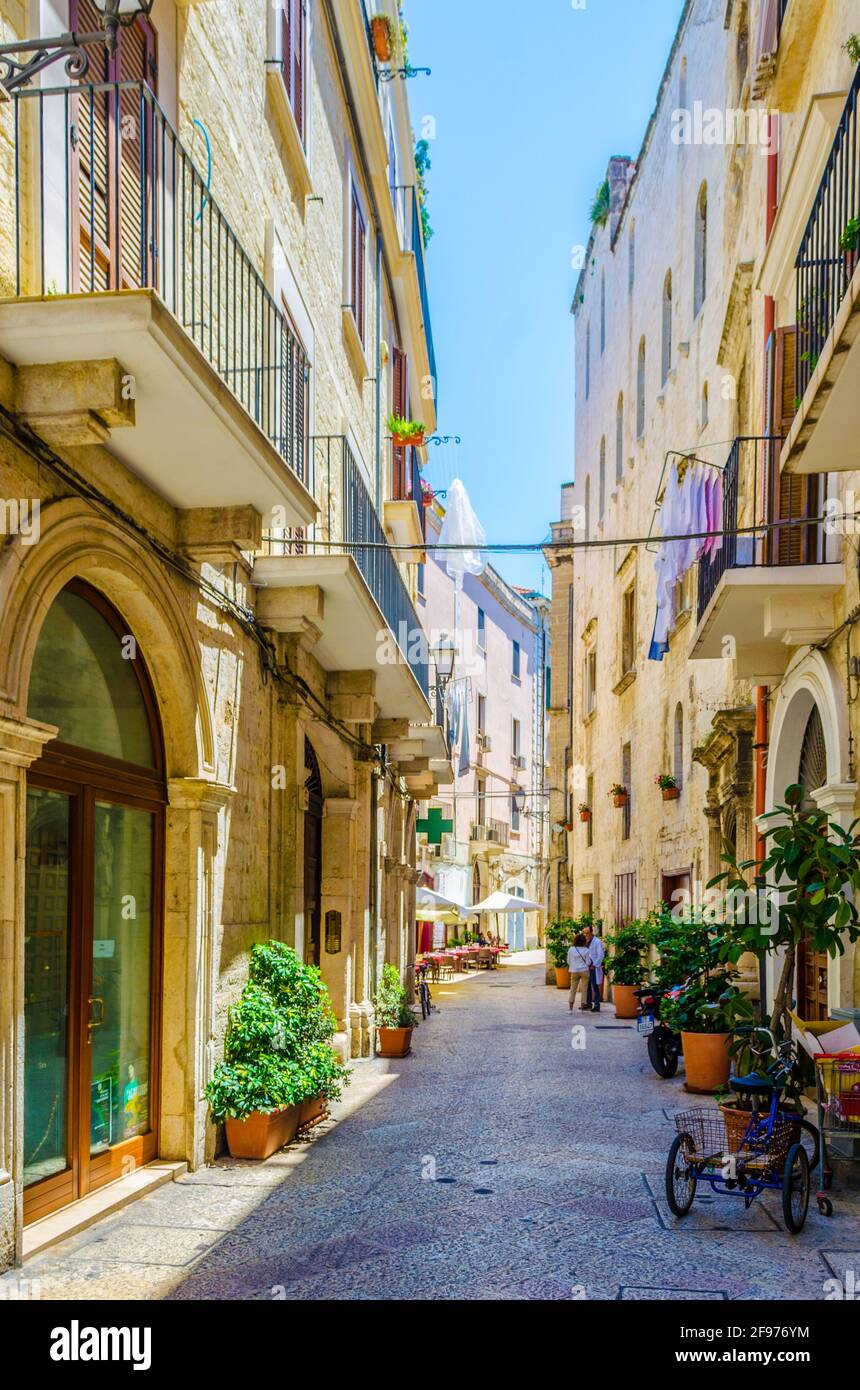 View of a narrow street in the Italian city Bari Stock Photo - Alamy