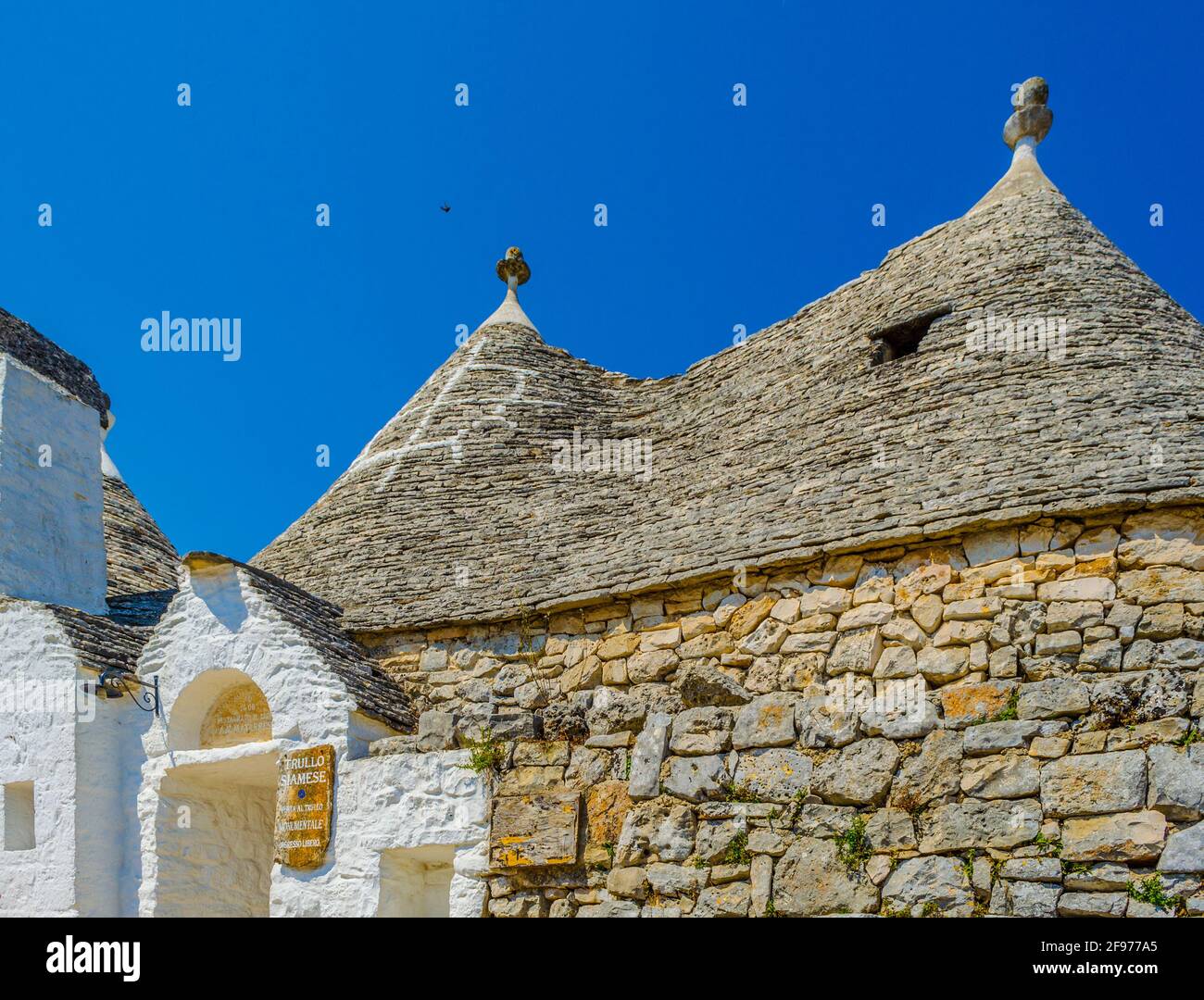 Rooftops of traditional Trulli houses in Alberobello, Italy Stock Photo ...