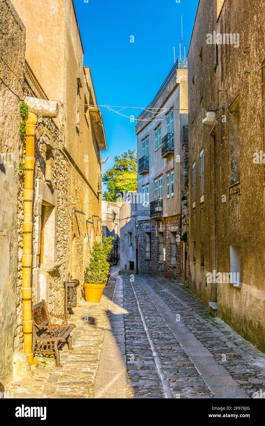 View of a narrow street in the historical center of Erice village on ...