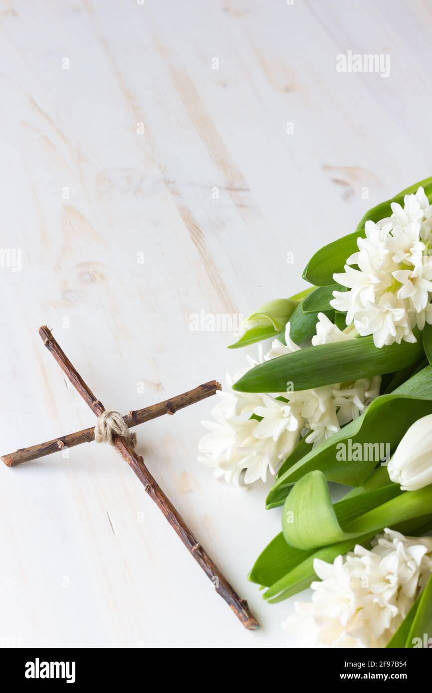border of christian cross and white tulips and hyacinth flowers on ...