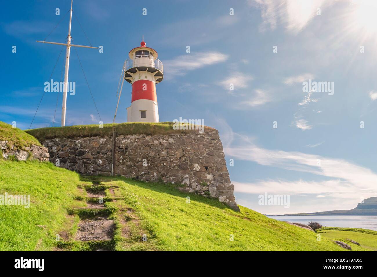 Old lighthouse and fortress in the harbor of Torshavn, the capital of ...