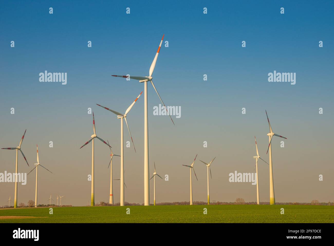 Group of big wind turbines to generate electrical power, green ...