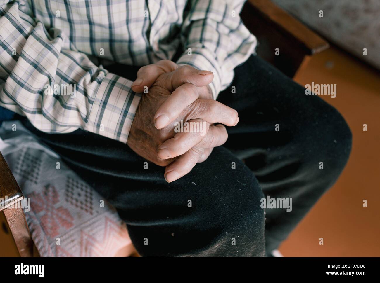 close-up of an old man's hands with wrinkles and age spots. elderly ...
