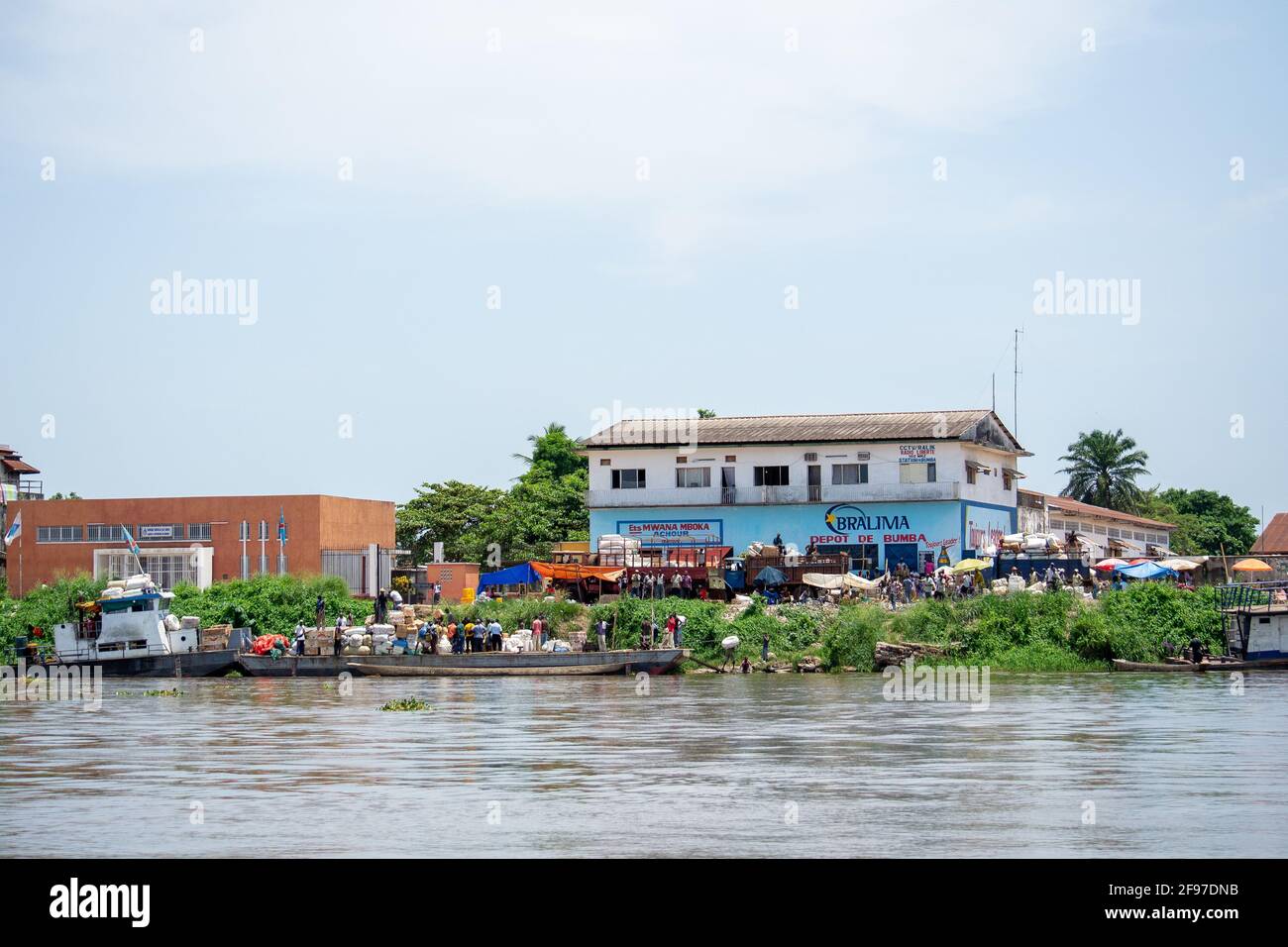 The city of Bumba, from the a very slow moving barge floating down ...