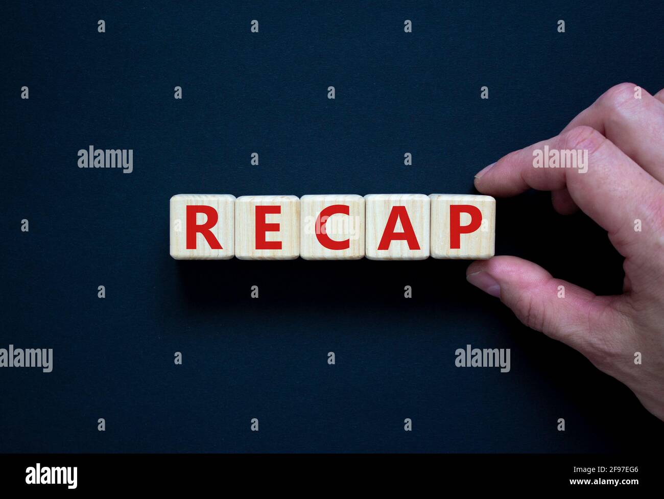 Recap symbol. Wooden cubes with word 'recap'. Businessman hand ...